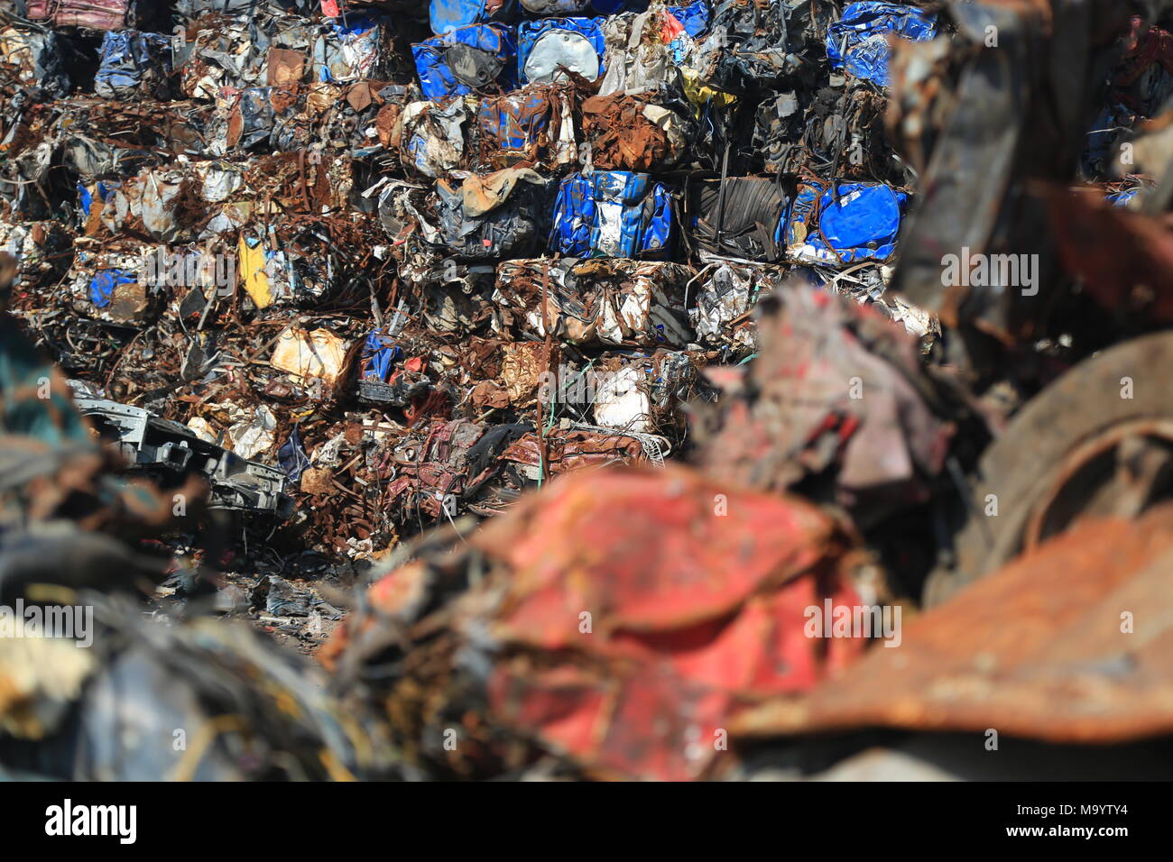 Scrap metal, wrecked and crushed parts Stock Photo - Alamy