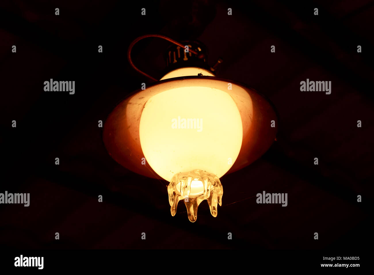 Hanging metal lamp in night Stock Photo - Alamy
