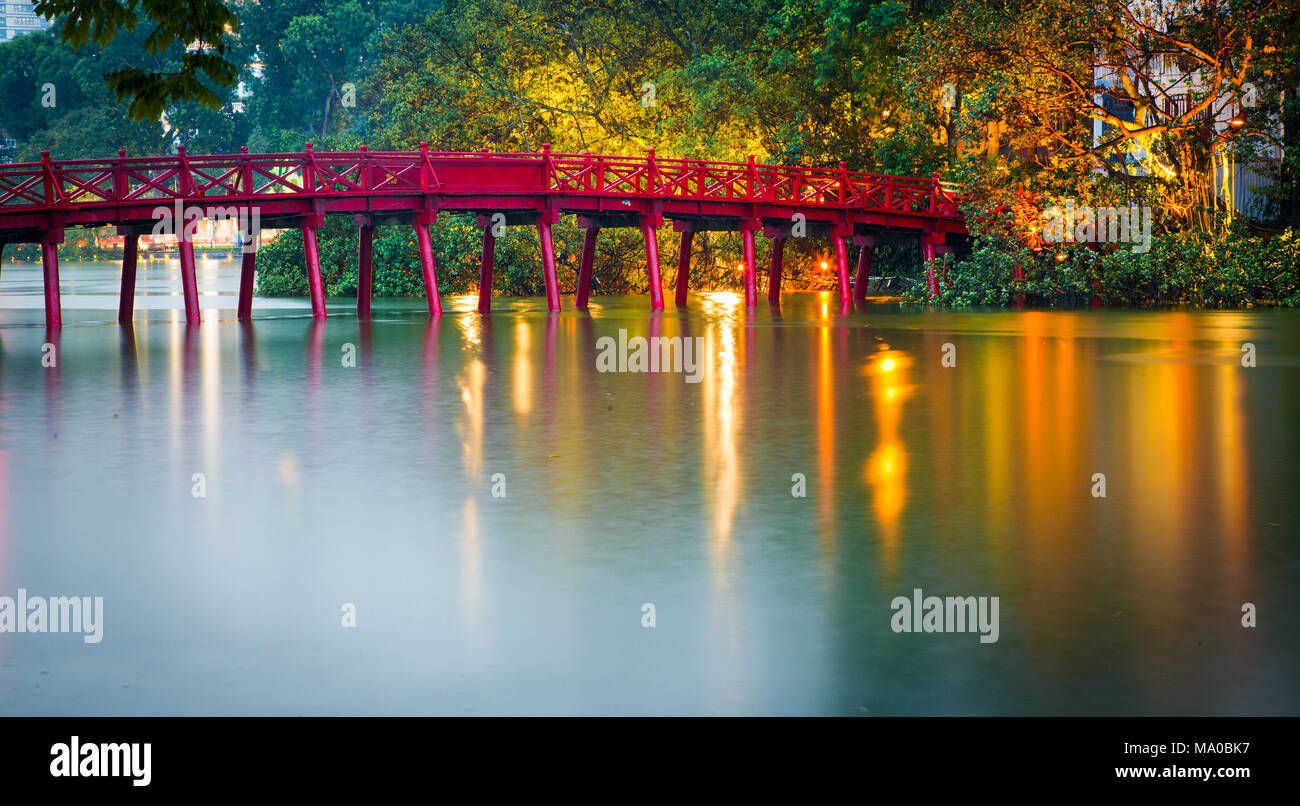 hanoi Red Bridge at night. The wooden red-painted bridge over the Hoan ...