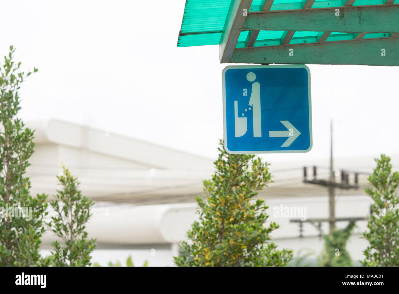 Urinal sign for men toilet, Signs to pee for men Stock Photo - Alamy