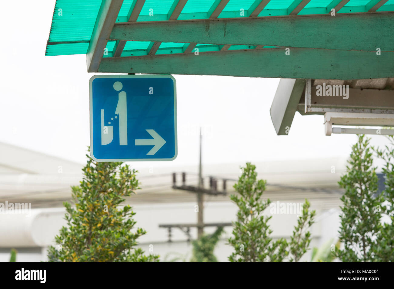 Urinal sign for men toilet, Signs to pee for men Stock Photo - Alamy