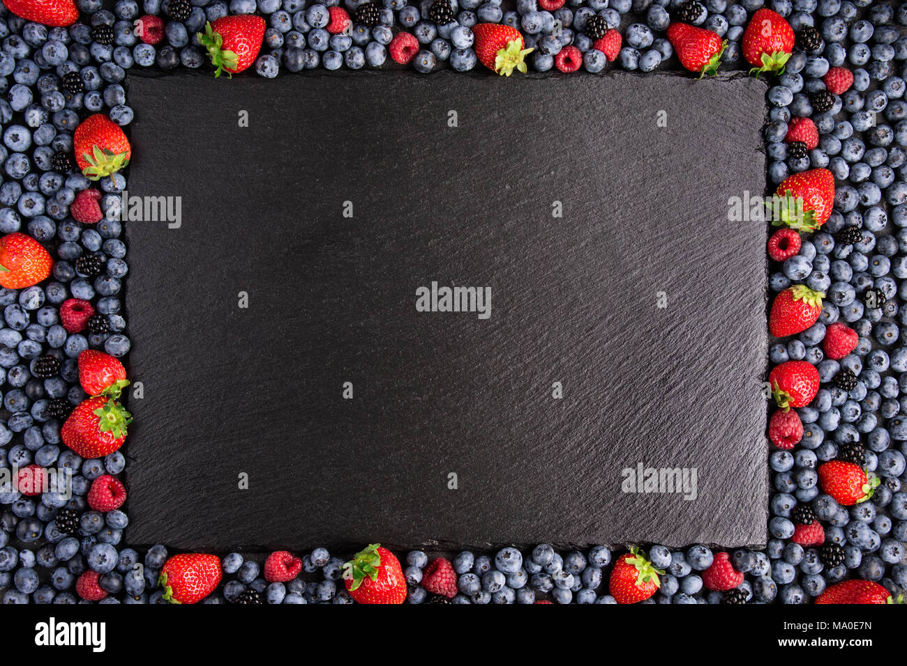 Summer berries background. Frame with berries assorted mix of ...