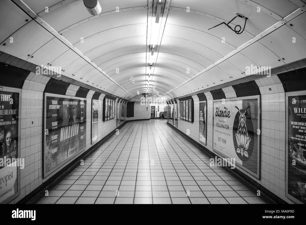 Black & white monochrome interior view inside deserted passageway ...