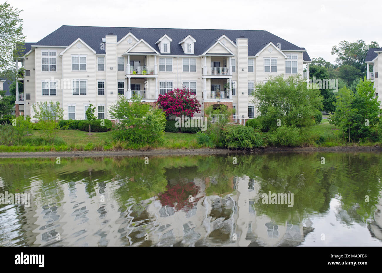 house building in front of lake Stock Photo - Alamy