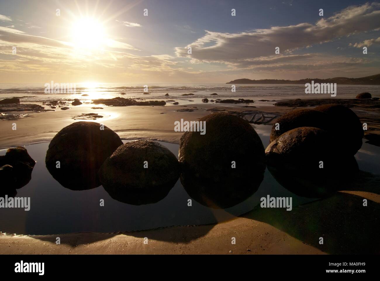 The Moeraki Boulders are unusually large and spherical boulders lying ...