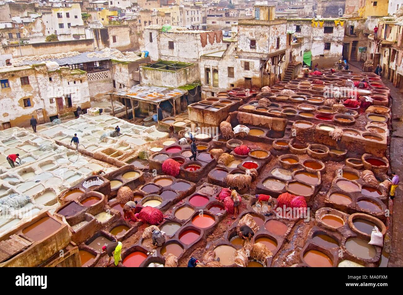 Traditional leather tanneries in the medina of Fez, Morocco, Africa ...