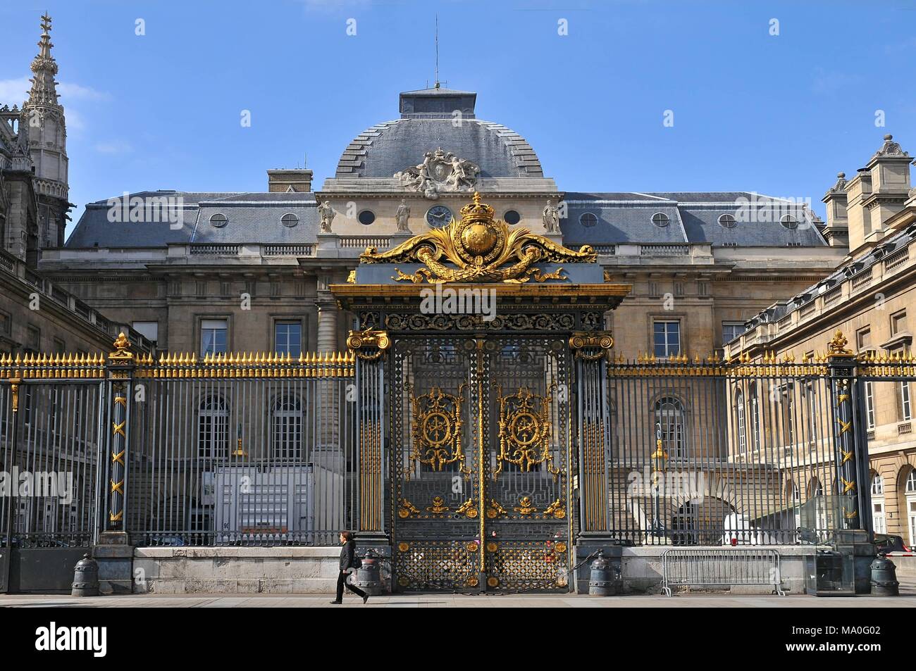 Main gate entrance to Palais de Justice in Paris, France Stock Photo ...