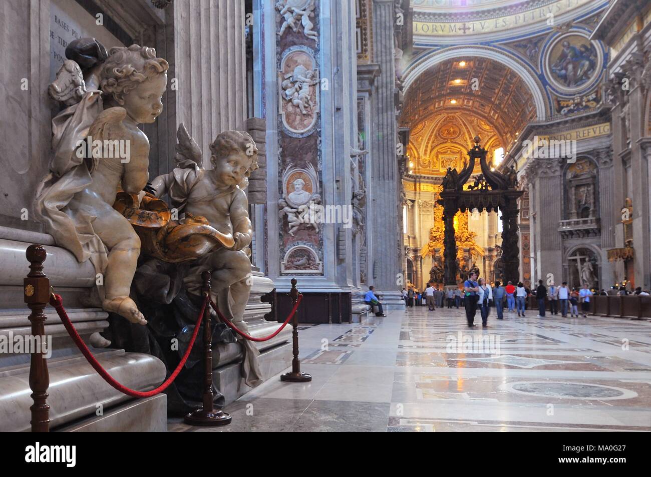 Angels Statues in interior of Saint Peter Basilica in Vatican, Italy ...
