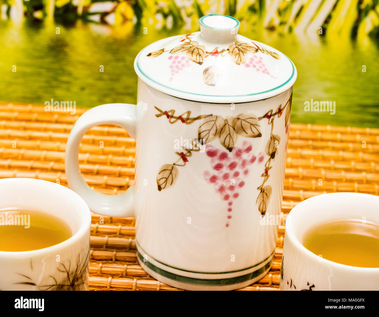 Tea On Patio Showing Break Time And Teacup Stock Photo - Alamy