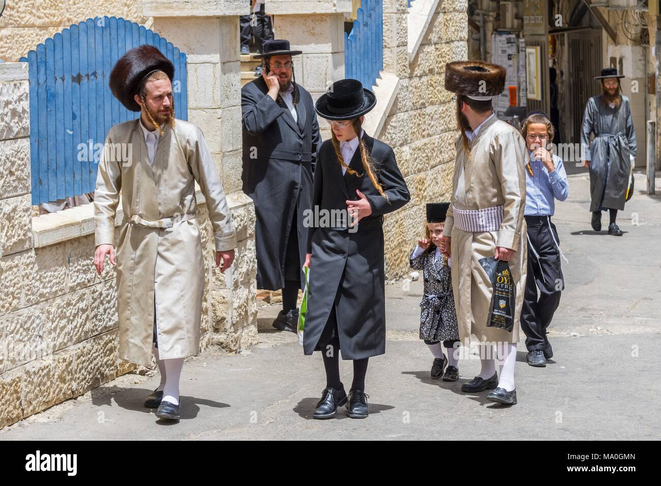 A traditional orthodox Judaic family with the child on the Mea Shearin ...