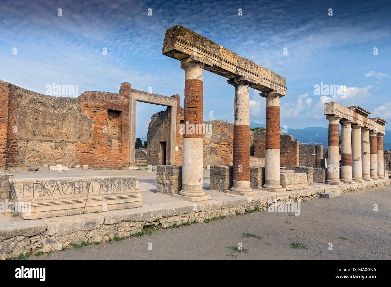 Stone and brick columns in The Forum in the archaeological excavations of Roman Pompeii near ...