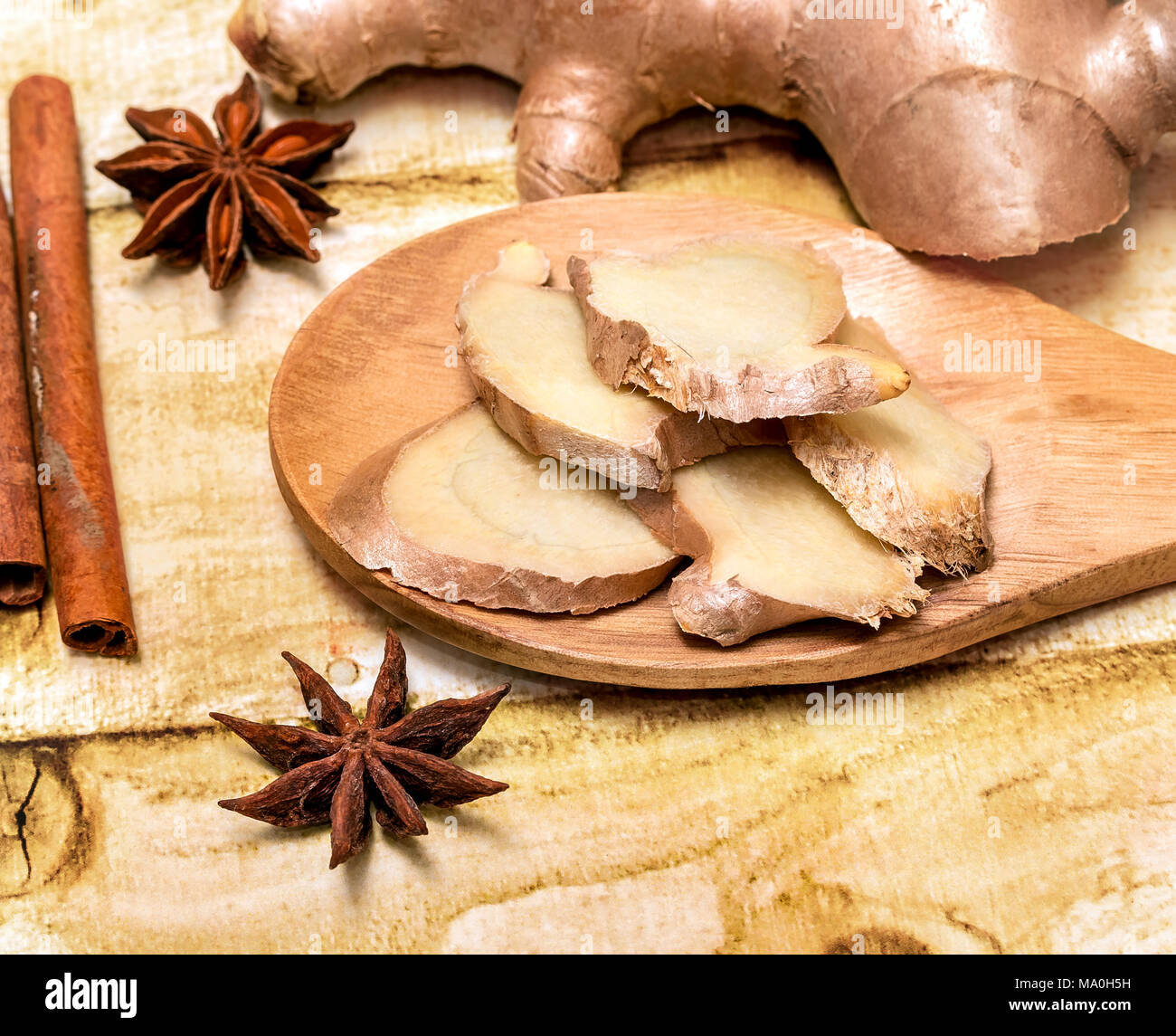 Sliced Ginger Root Showing Star Anise And Spices Stock Photo - Alamy