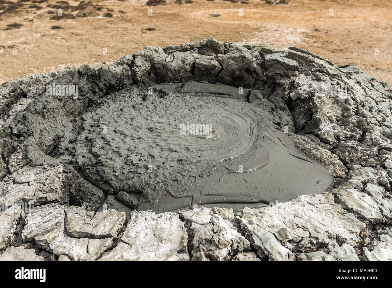 Mud volcano crater Stock Photo - Alamy