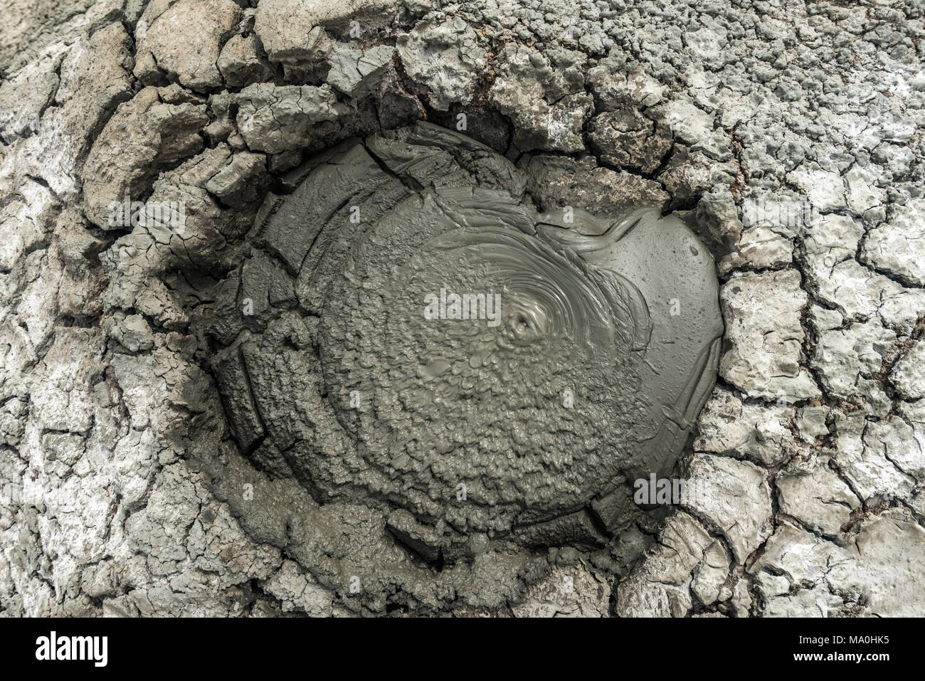 Mud volcano crater Stock Photo - Alamy