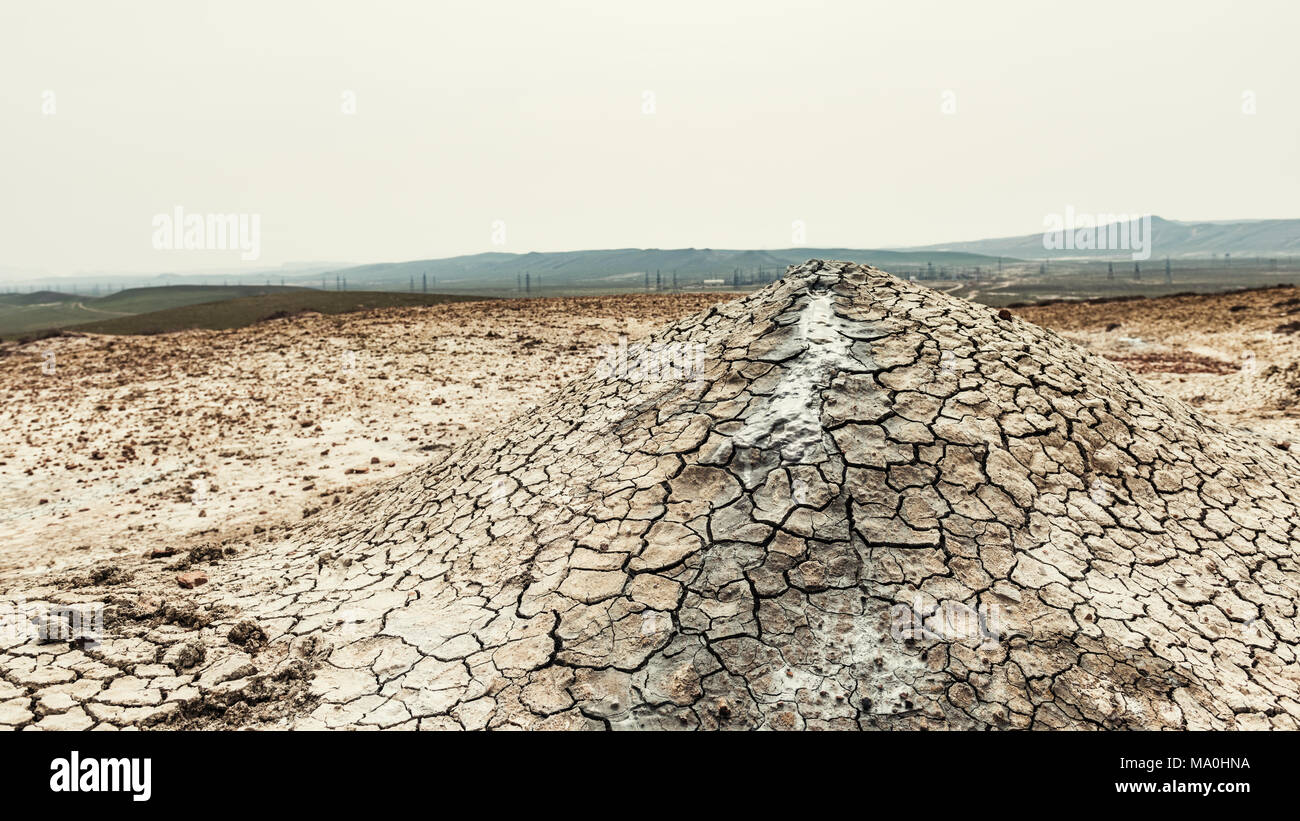 A small mud volcano Stock Photo - Alamy