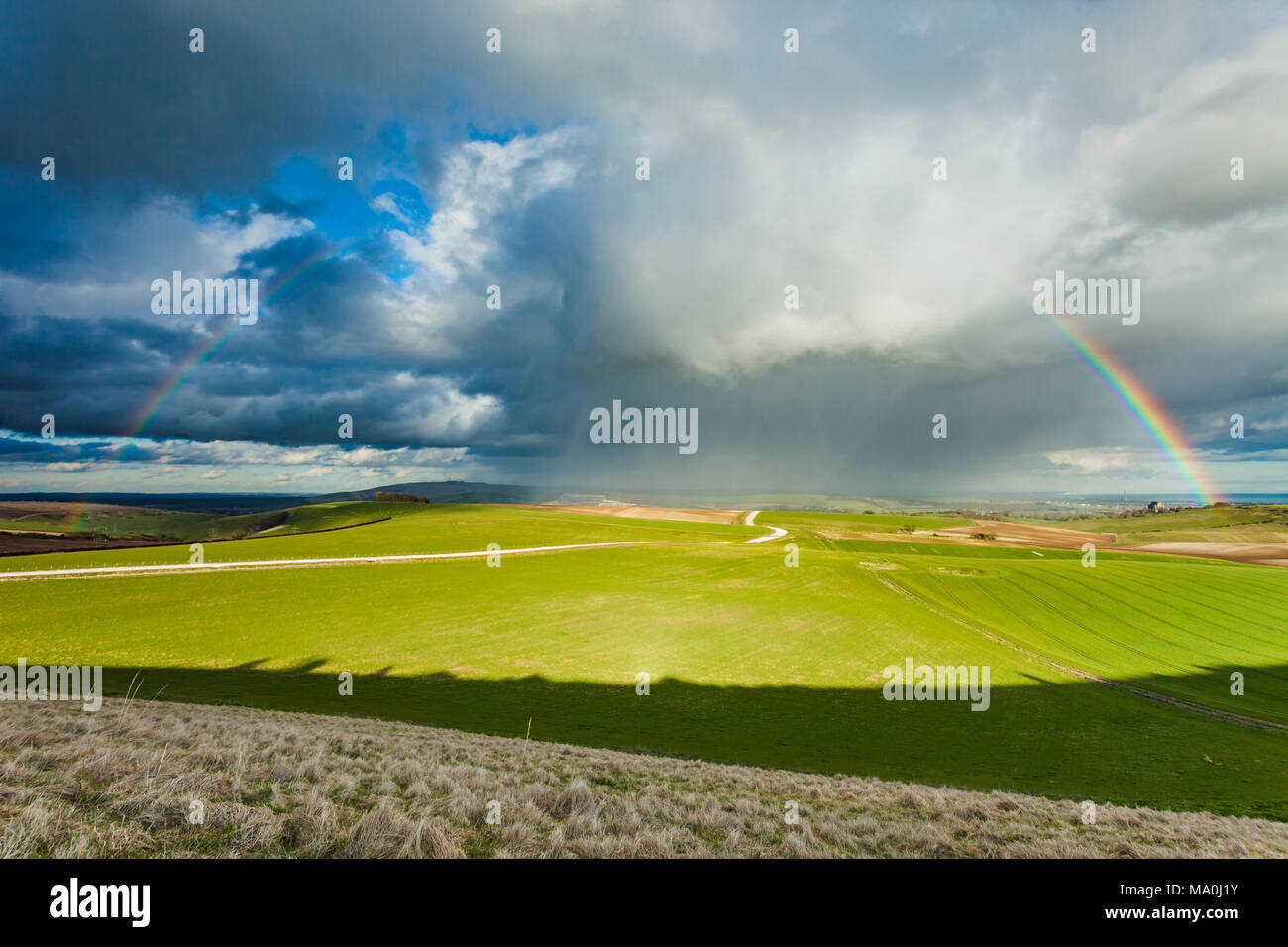 Rainbow in spring england hi-res stock photography and images - Alamy