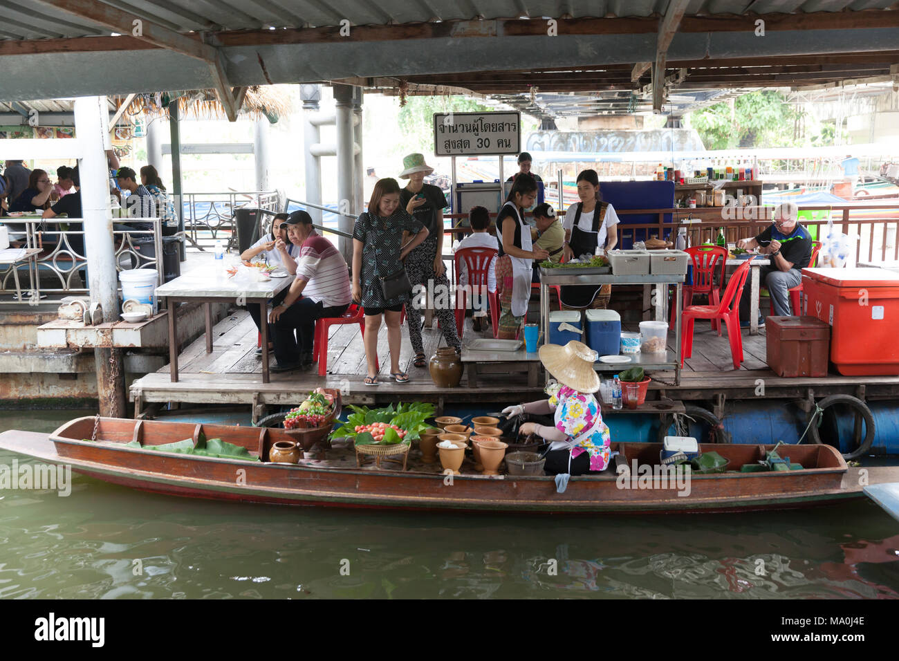 BANGKOK, THAILAND - MARCH 04, 2018: View of a stall with a merchants ...