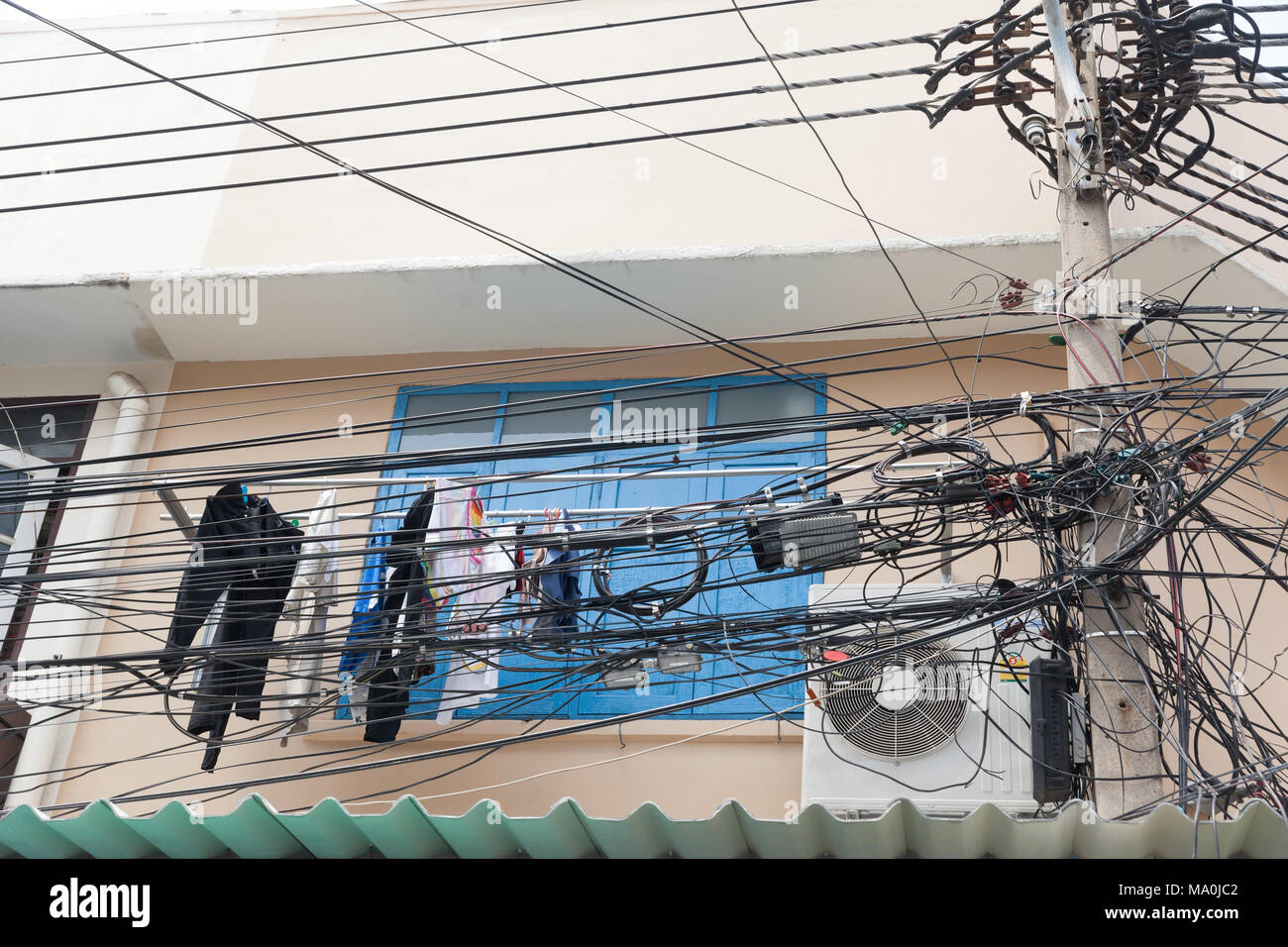 BANGKOK, THAILAND - MARCH 05, 2018: A typical electricity cables pillar ...