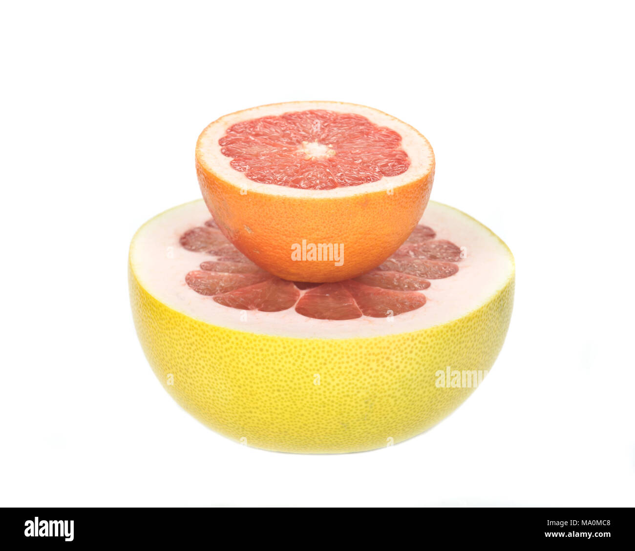 Cut in half pomelo and grapefruit isolated on white background Stock ...