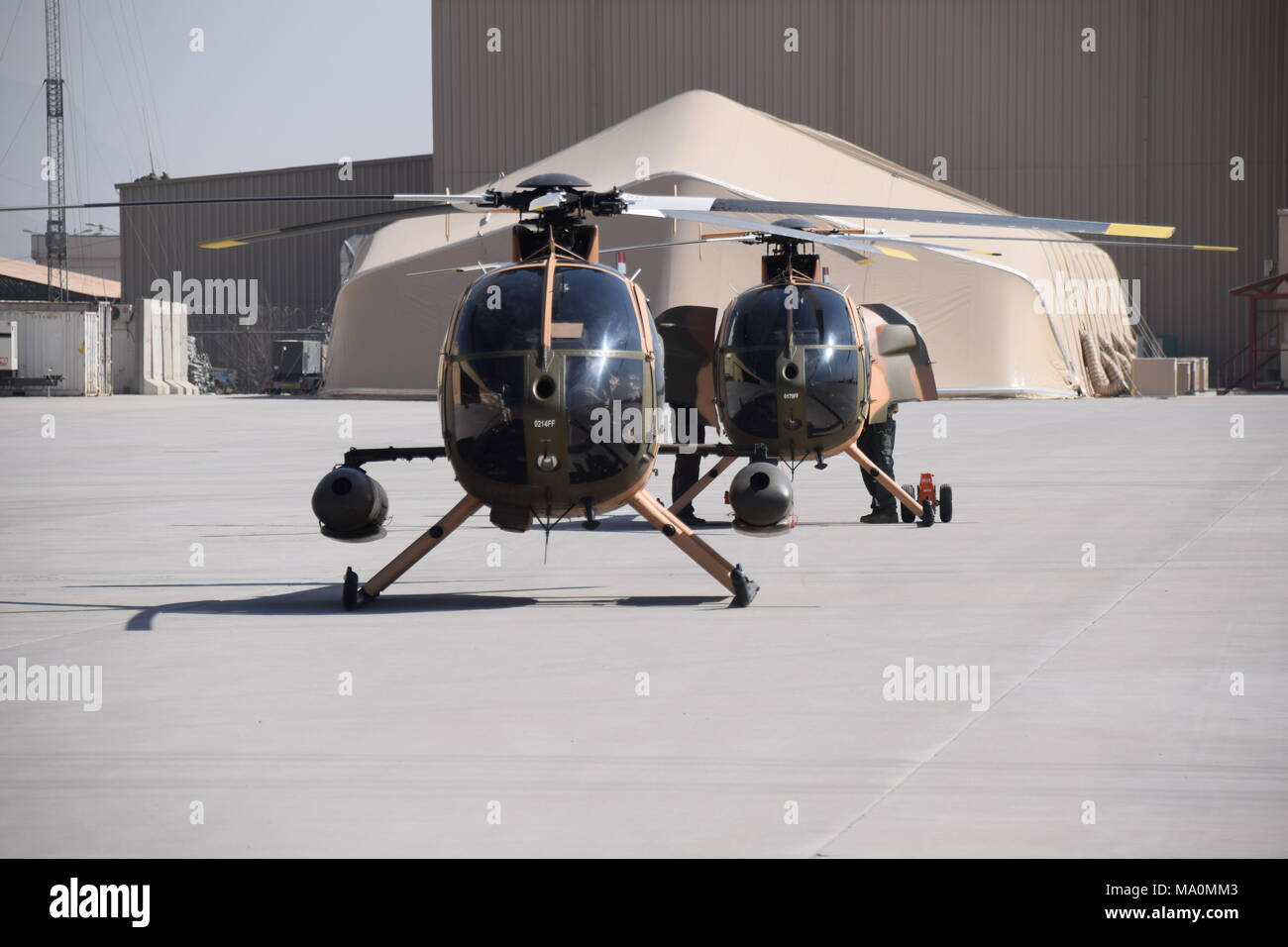 Two MD 530F Cayuse Warrior light attack helicopters of the Afghan Air ...
