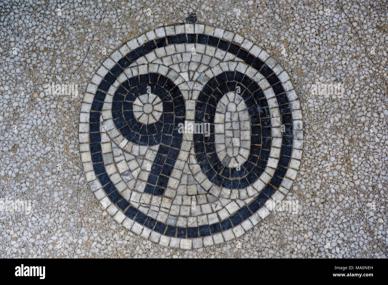 the number 90 or ninety made from a mosaic of small pieces of tiles on ...