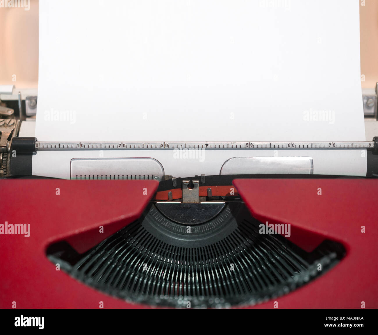 Old Red Color Typing Machine, with blank white sheet, waiting for your ...