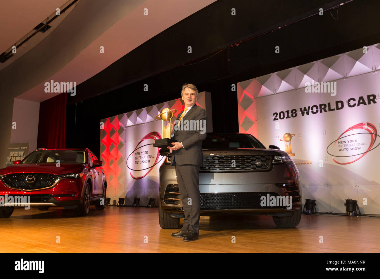 New York, NY - March 28, 2018: Dr. Ralf Speth CEO poses with trophy ...