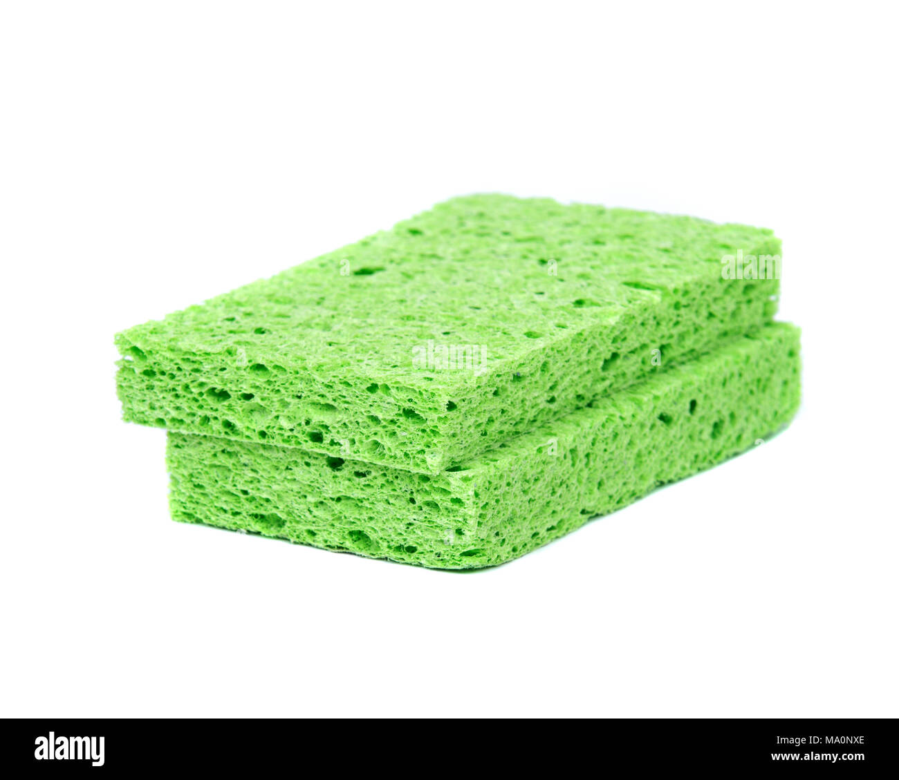 Household green sponge separated on white background Stock Photo - Alamy