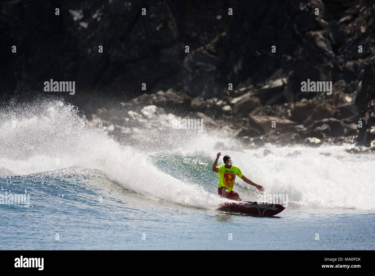 Sam August son of Robert August slicing a wave at ollies point. wearing ...