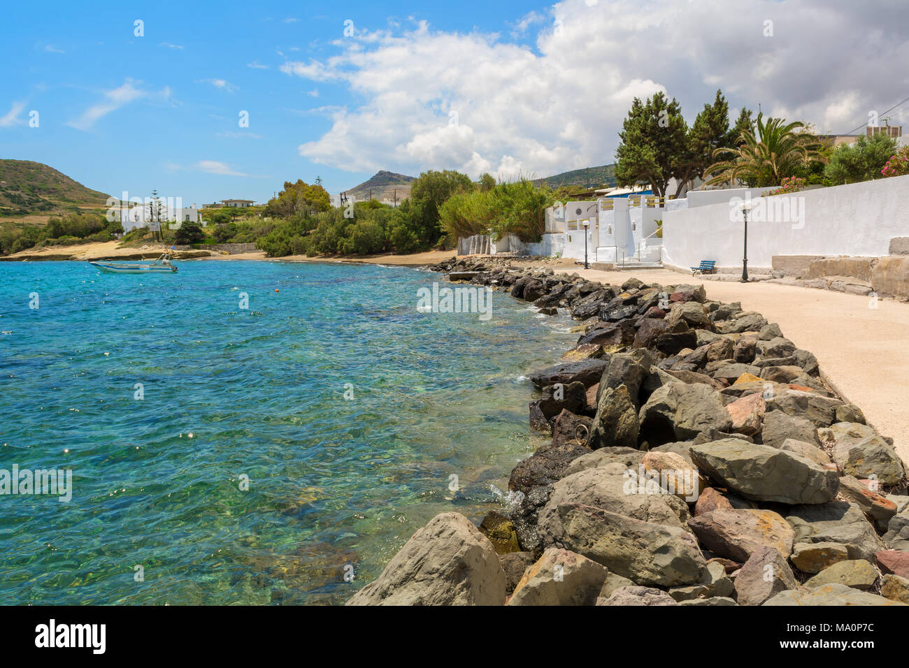 MILOS, GREECE - May 18, 2017: Coastal promenade along sea in Pollonia ...