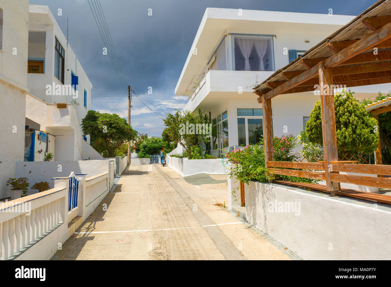 MILOS, GREECE - May 18, 2017: Street with typical Greek architecture of ...