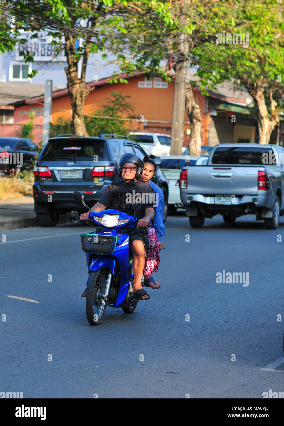 Thai family riding motorbike hi-res stock photography and images - Alamy