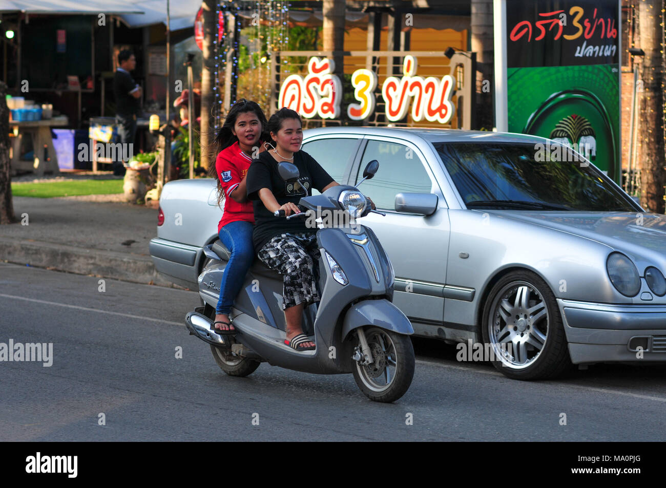 Bangkok moped riders hi-res stock photography and images - Alamy