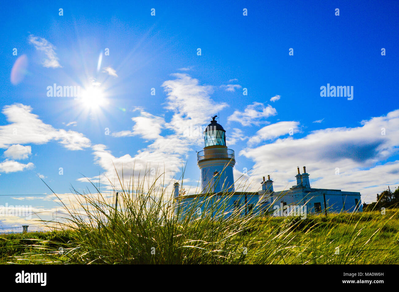 Lighthouse at the beach Stock Photo - Alamy