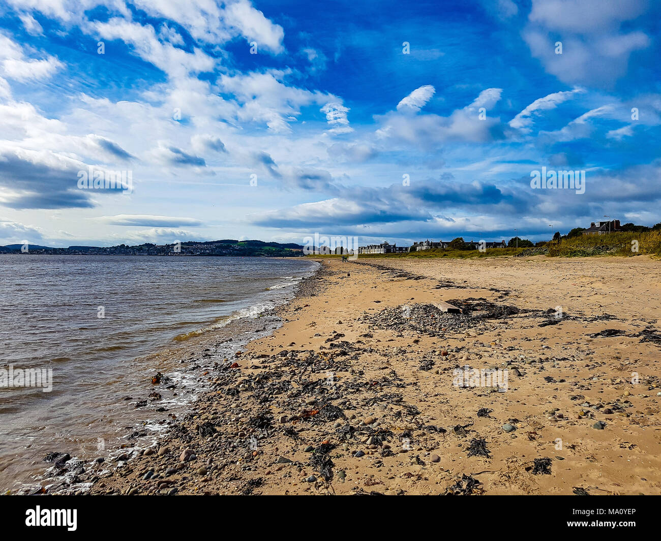 Cloudy sky beach view hi-res stock photography and images - Alamy