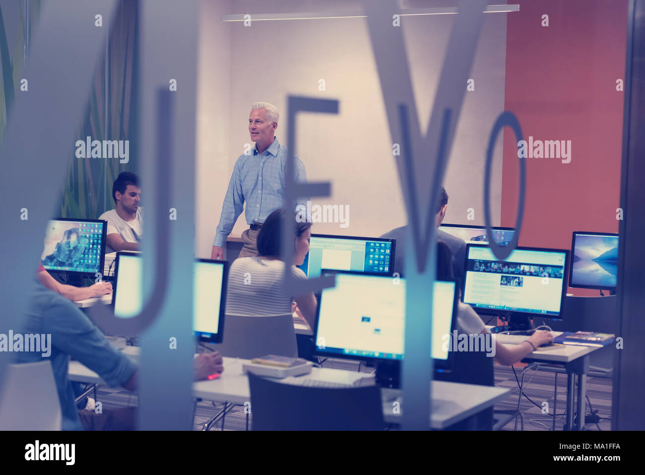 technology students group portrait in computer lab school classroom ...