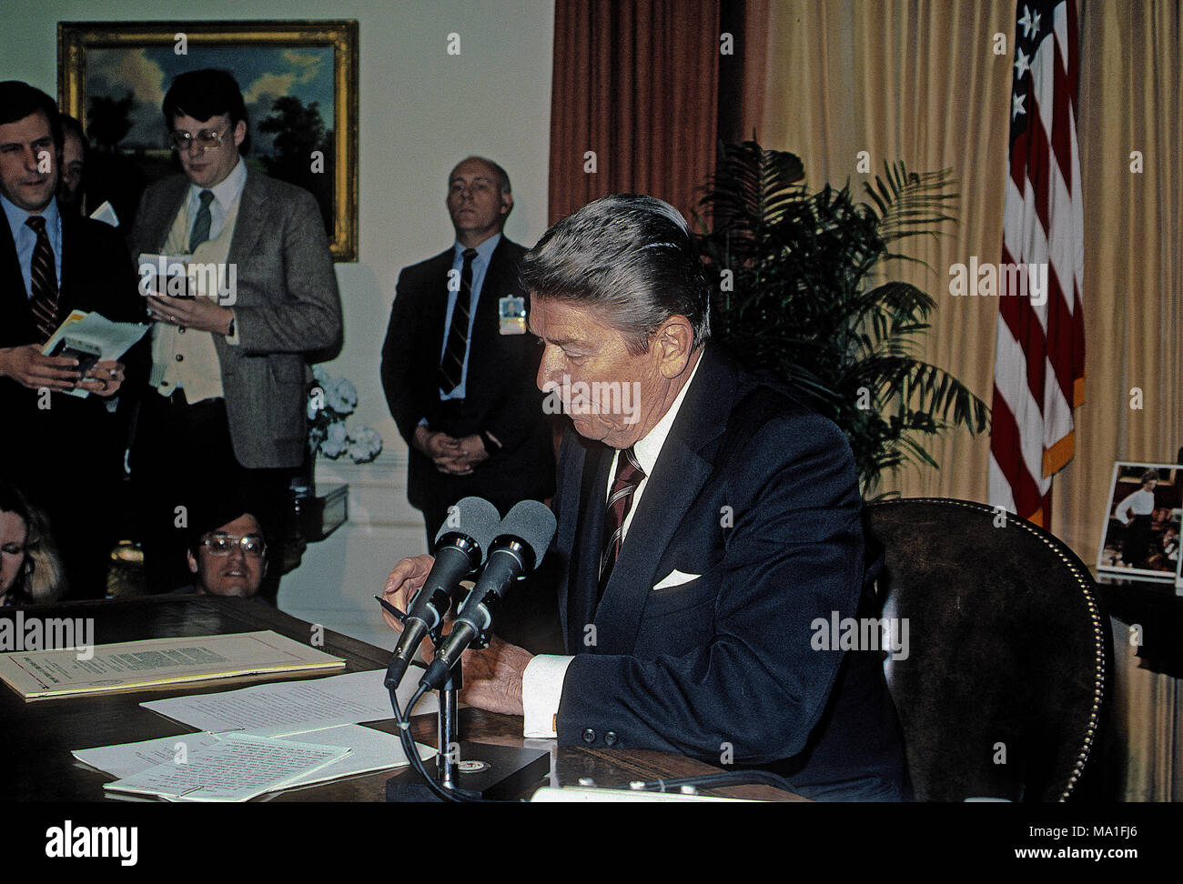 Washington DC., USA, March 6, 1985 President Ronald Reagan seated at ...