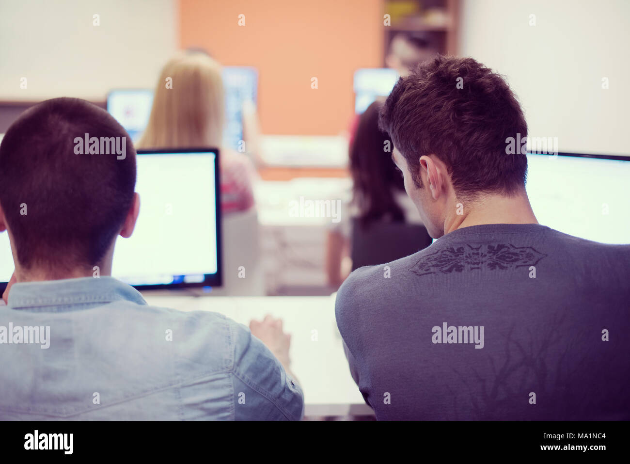 technology students group in computer lab school classroom working on ...