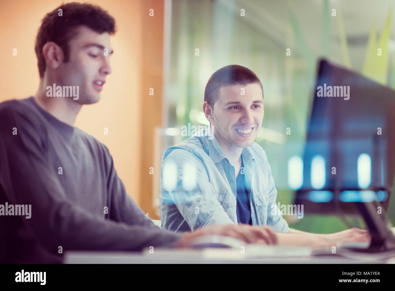 technology students group in computer lab school classroom working on ...