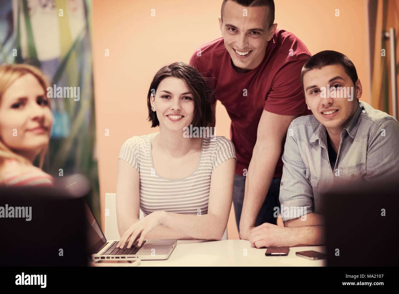 technology students group in computer lab school classroom working on ...