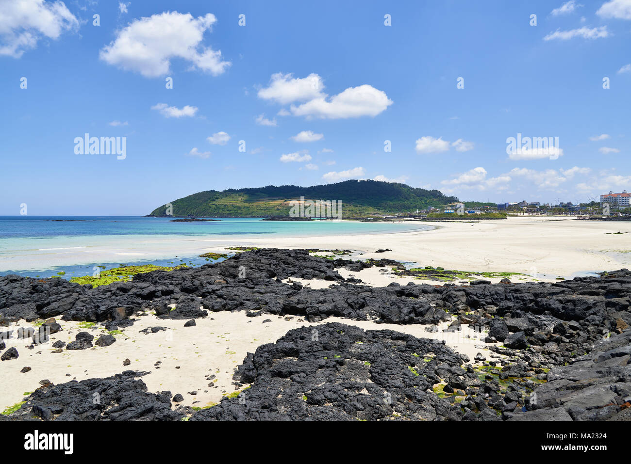 Hamdeok beach and Seoubong peak in Jeju, Korea. Hamdeok Beach is famous ...