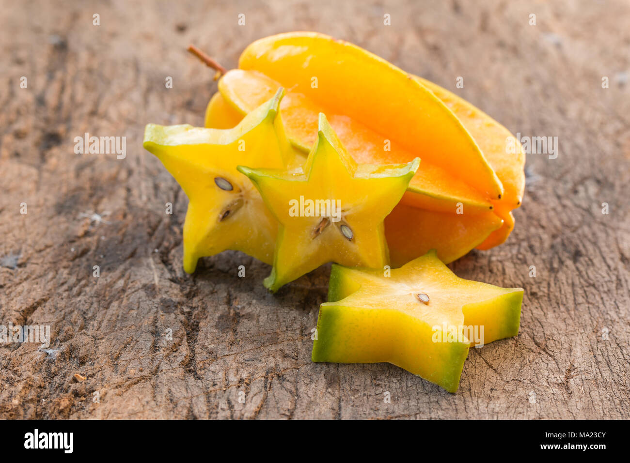 star apple on old wood Stock Photo - Alamy