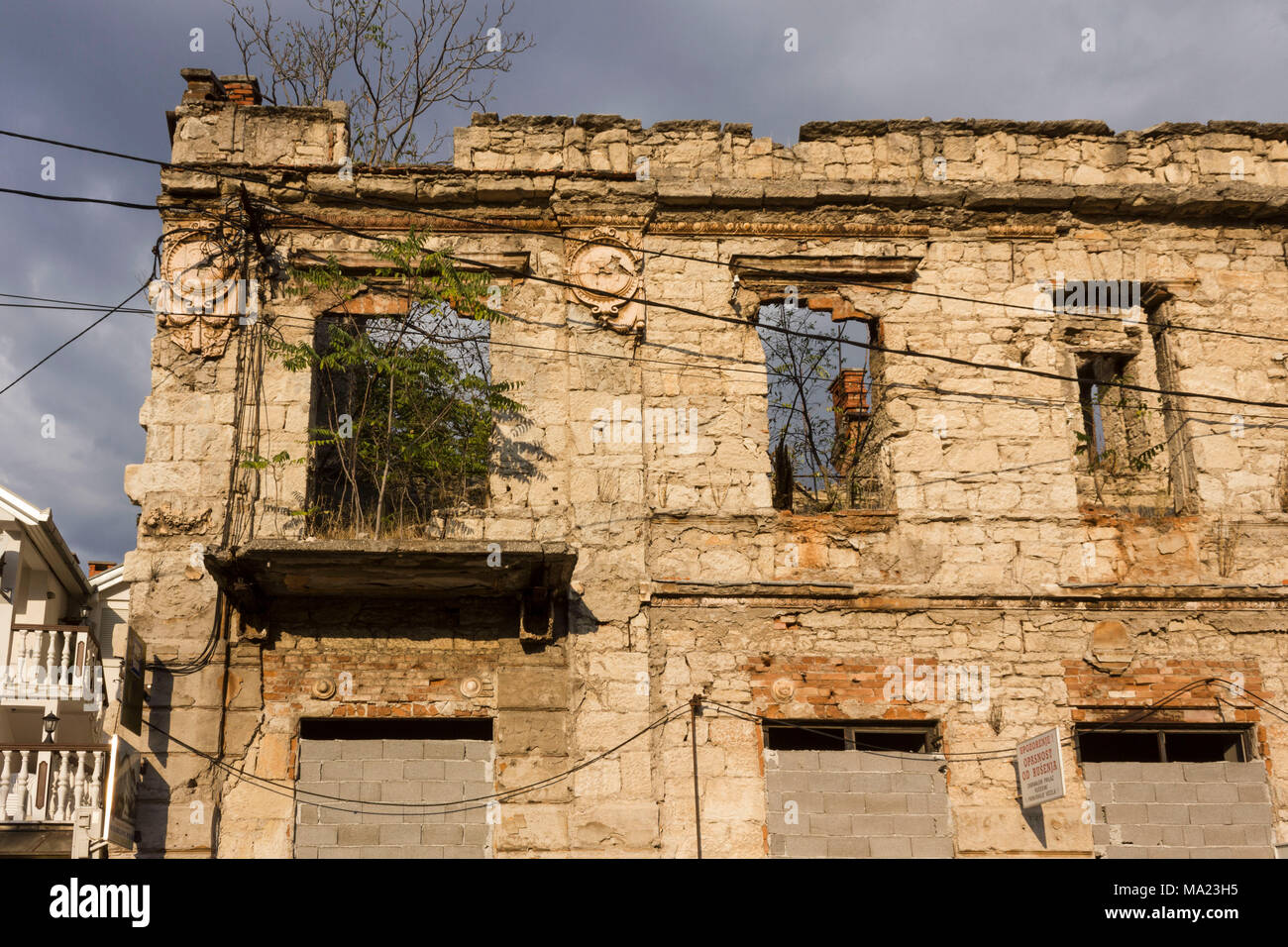MOSTAR, BOSNIA AND HERZEGOVINA - AUGUST 16 2017: Building ruin in ...