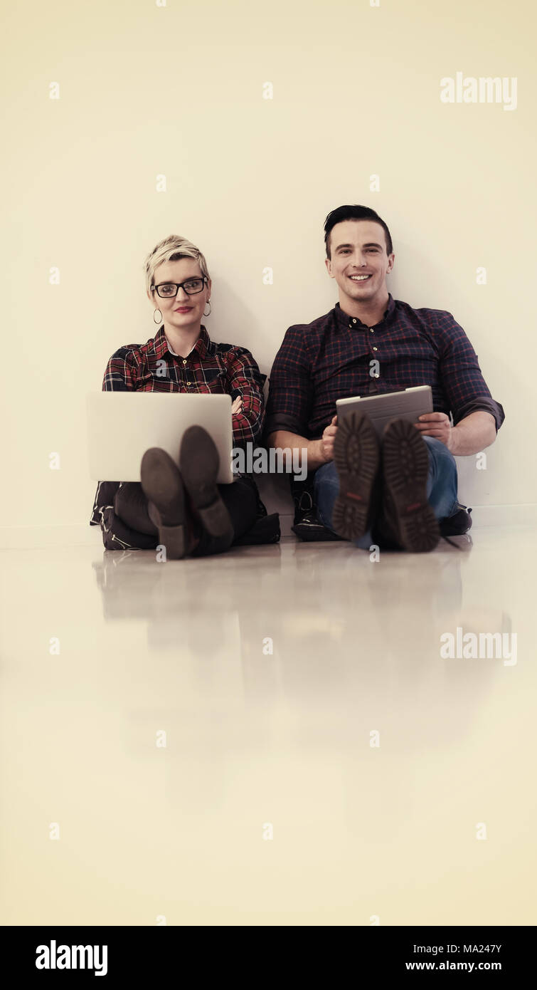 startup business and new mobile technology concept with young couple in ...