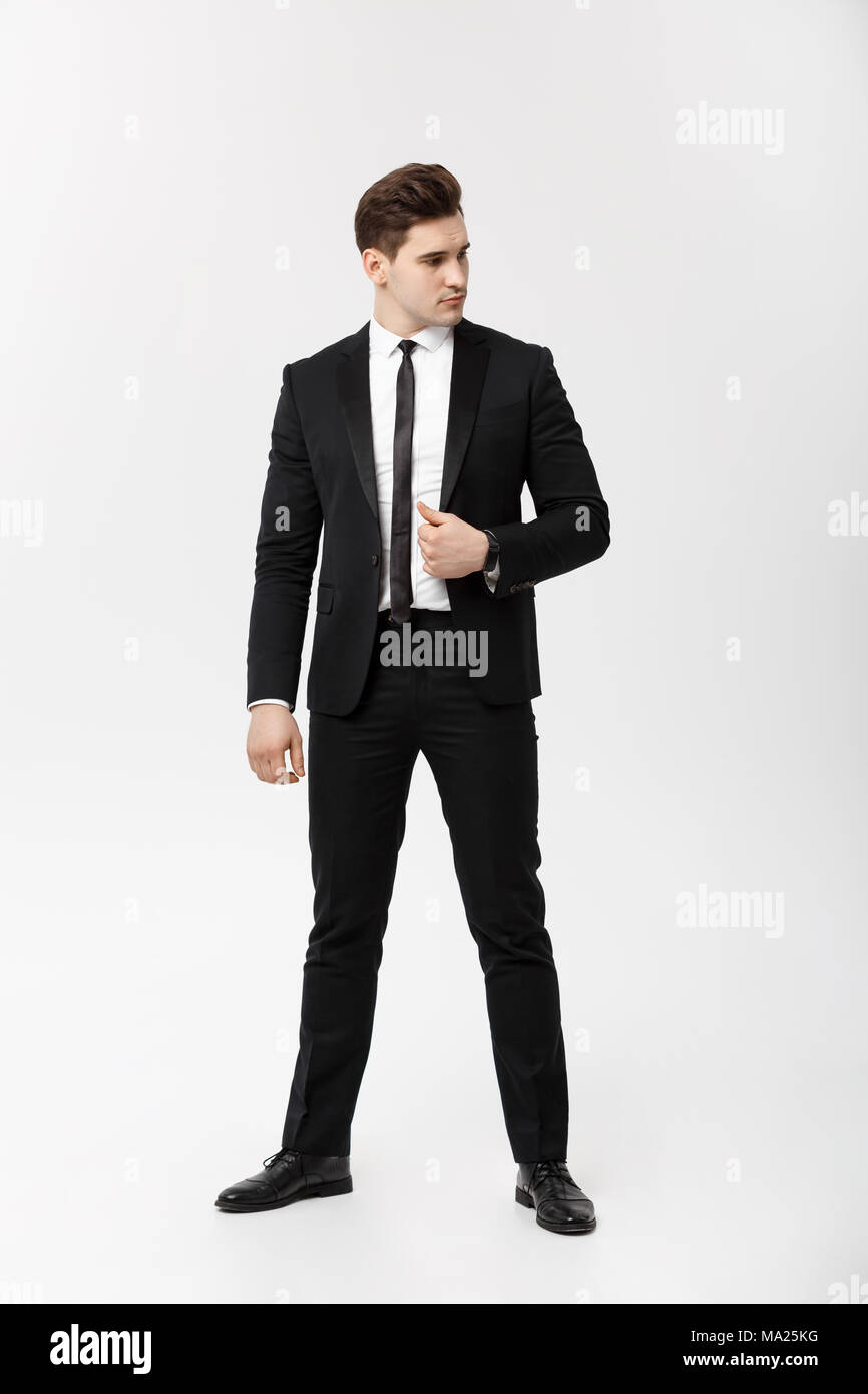 Full length Portrait Businessman posing stylishly on white background ...