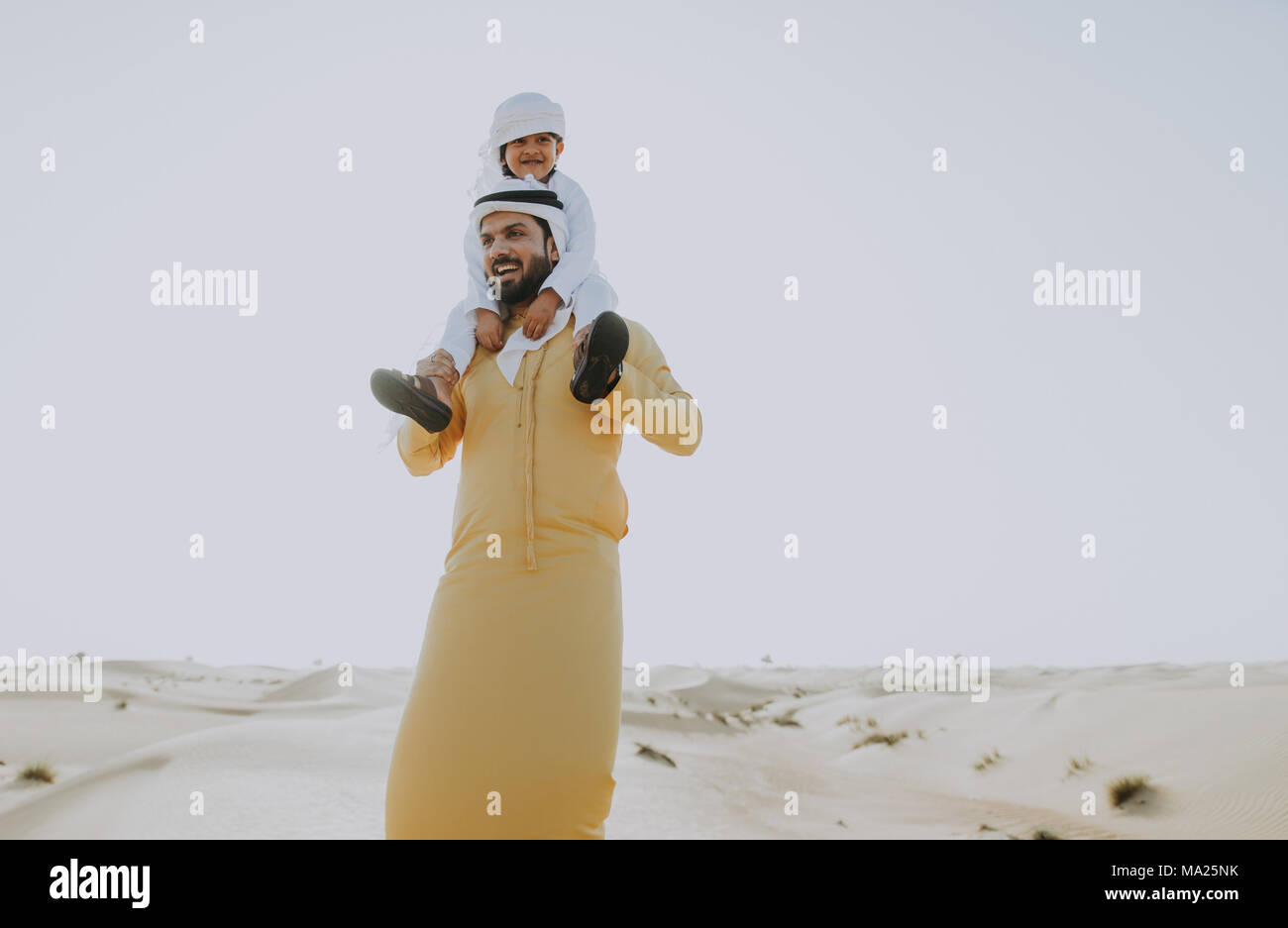 Father and son spending time in the desert Stock Photo - Alamy