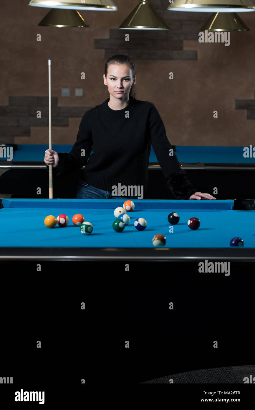 Portrait Of A Young Woman Concentration On Ball Stock Photo - Alamy