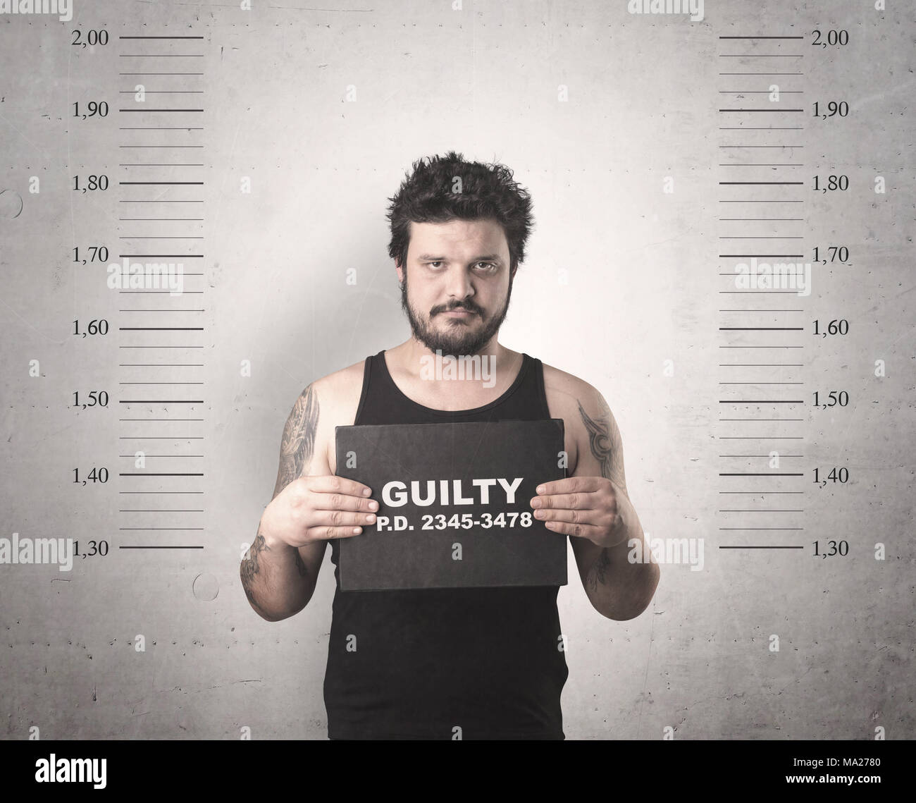Caught guilty man with ID signs on his hand Stock Photo - Alamy