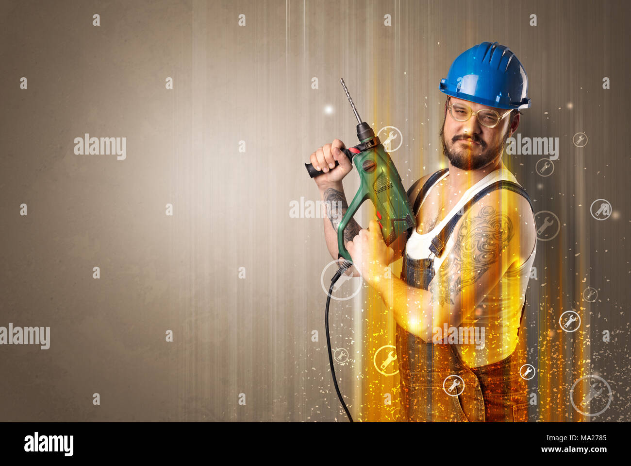Manual worker with wrench symbols and tool Stock Photo - Alamy