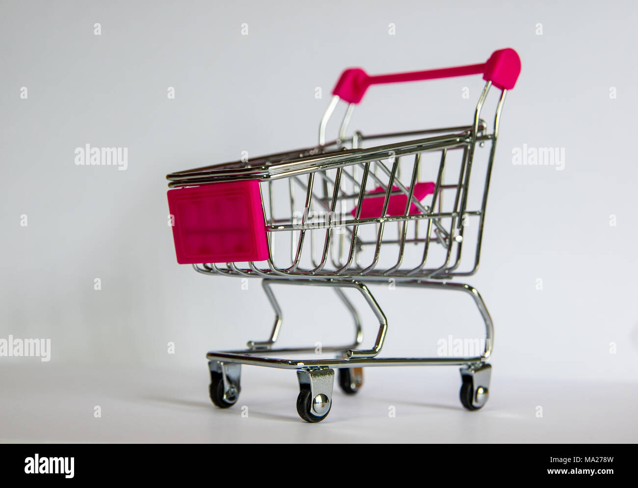 MIni cart on white background Stock Photo - Alamy